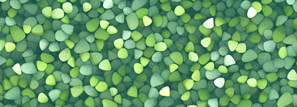 many small, smooth stones in different shades of green, from light to ...