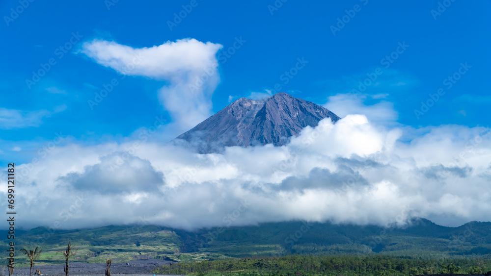 Eruption of Volcano Semeru on the island of Java. The volcano emits ash ...