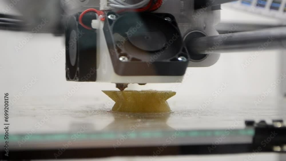 Working 3D printer printing object from plastic. Printing model from ...