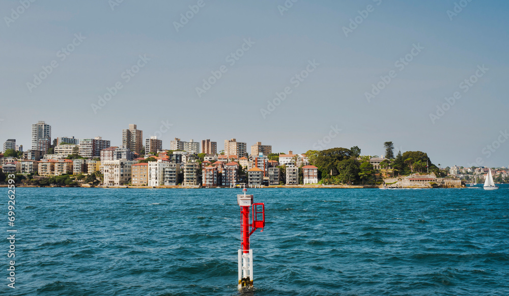 Expansive residences in the coastal of Manly Beach, with its tree-lined ...