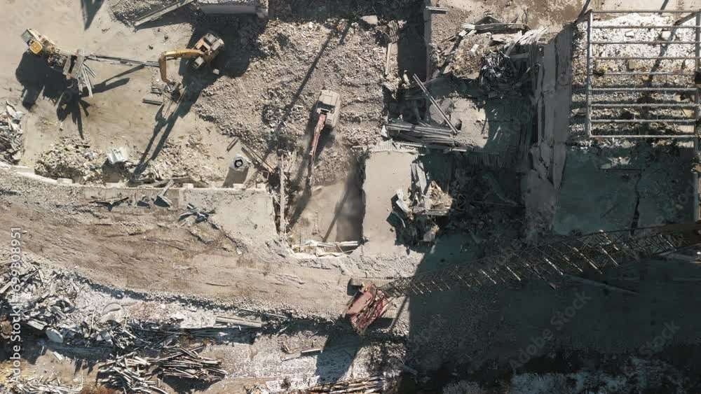 Demolition of the building. Excavator working rubbish in a demolition ...