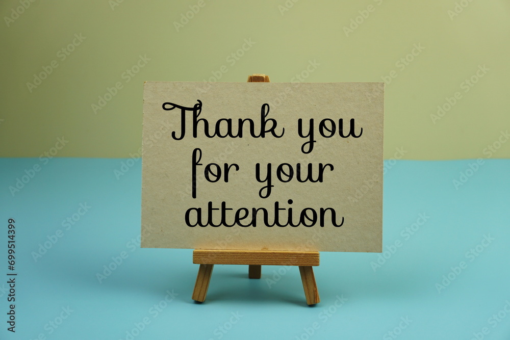 Thank you for your attention text message written on paper card with ...
