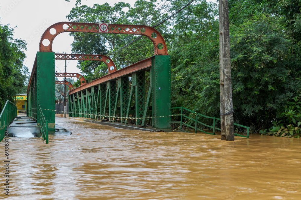 Flooding of an iron bridge due to flooding from the Pomba River, in ...