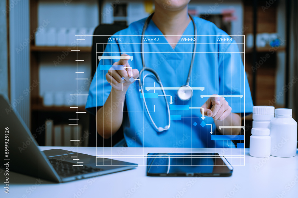 Project manager working and update tasks with Gantt chart scheduling ...