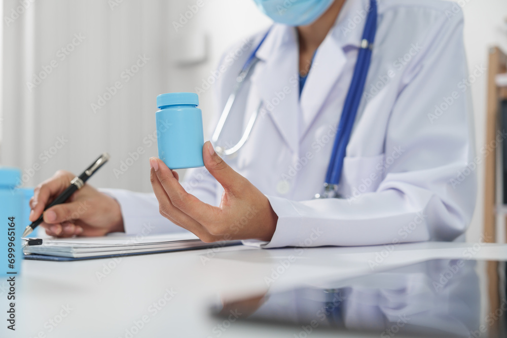 Specialist medical professionals check the quality and expiration date ...