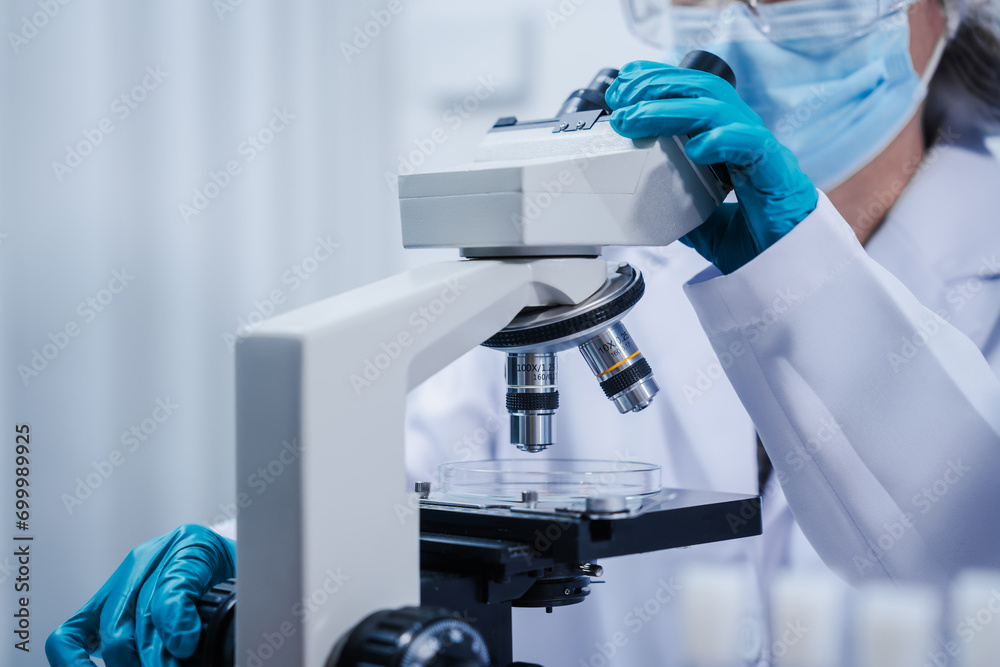 Professional scientists in lab working with blood samples. to find ...