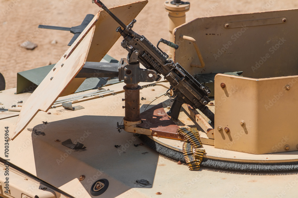 Machine gun mounted on Humvee and person shooting the .50 Caliber ...