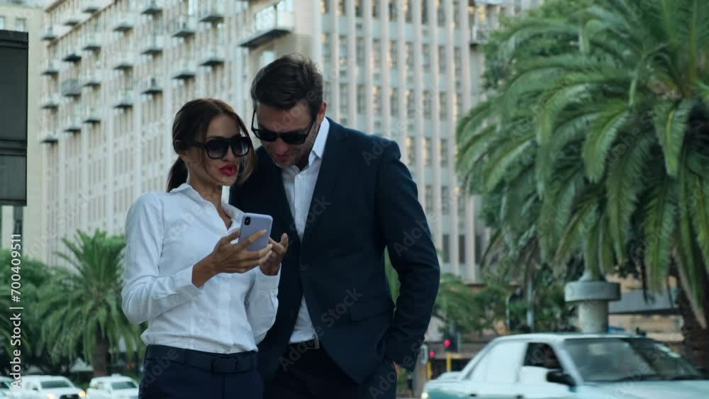 Two mature professional business executives working having conversation ...