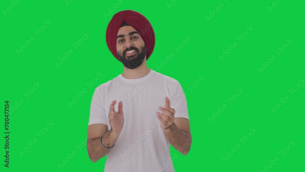 Happy Sikh Indian man clapping and appreciating Green screen Stock ...