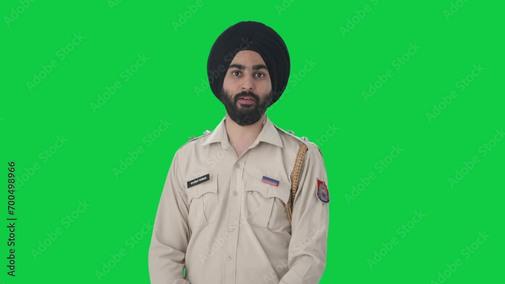 Angry Sikh Indian police man talking Green screen Stock Video | Adobe Stock