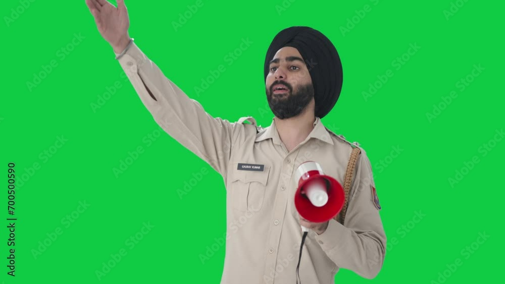 Angry Sikh Indian police man controlling crowd Green screen Stock Video ...