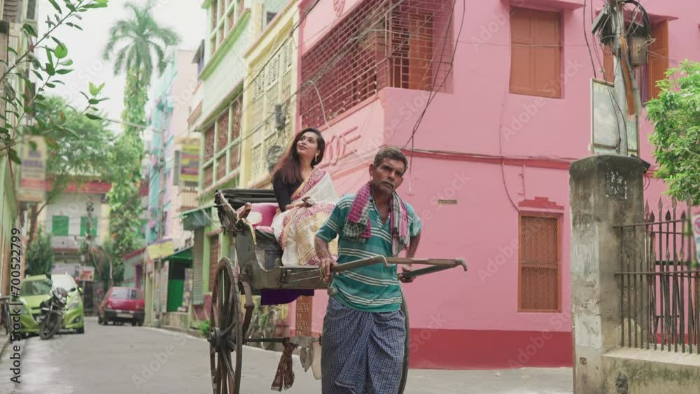 An aged or elderly Indian Asian male human or hand pulled rickshaw ...