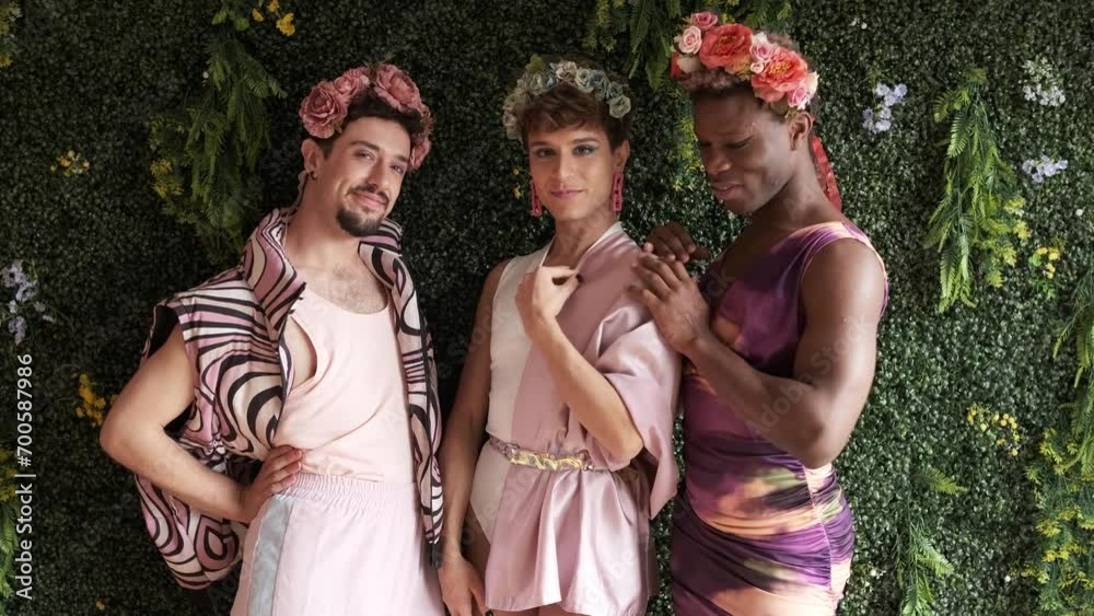 Trans people posing in colorful dresses and a crown of flowers Stock ...