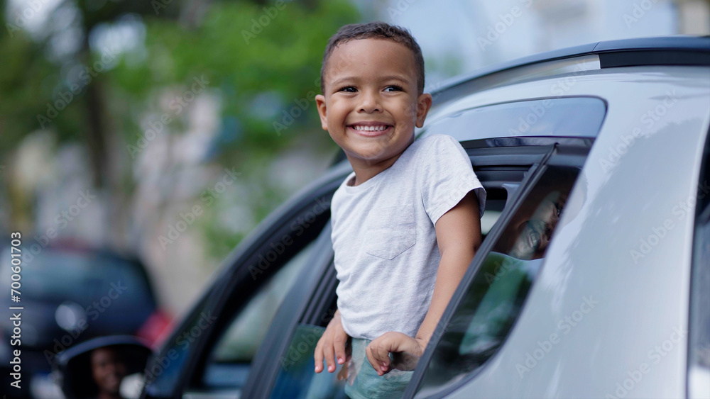 Little kid looking out car window. Summer trip with family. Happy boy ...