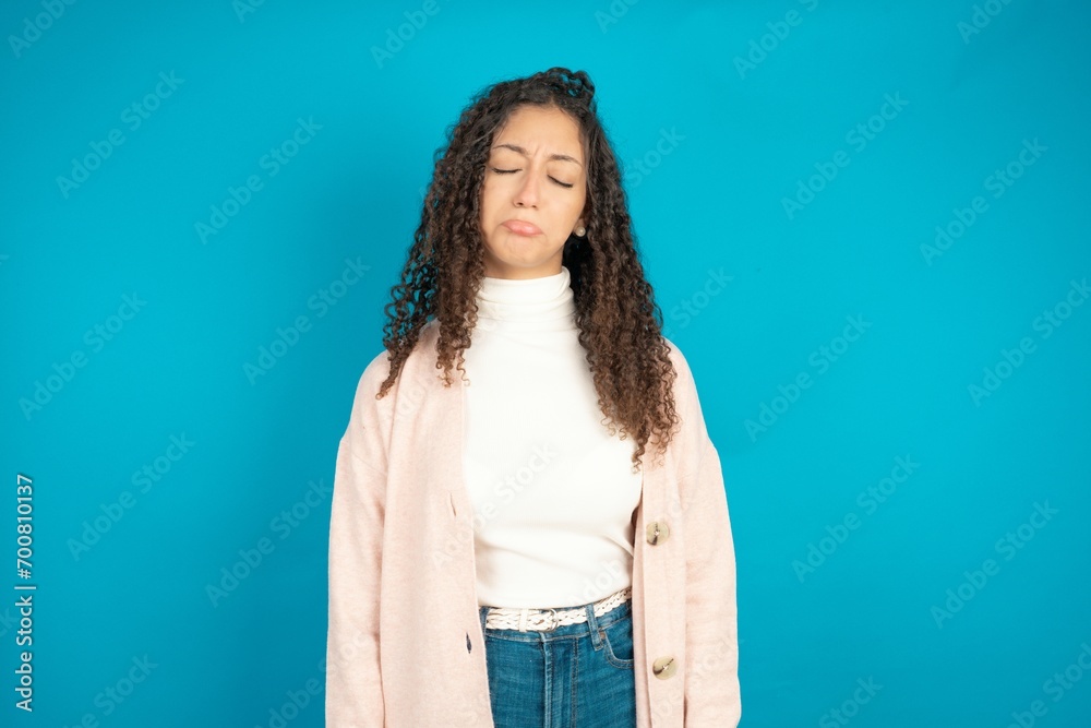 Dismal gloomy rejected beautiful teen girl wearing brown cardigan has ...