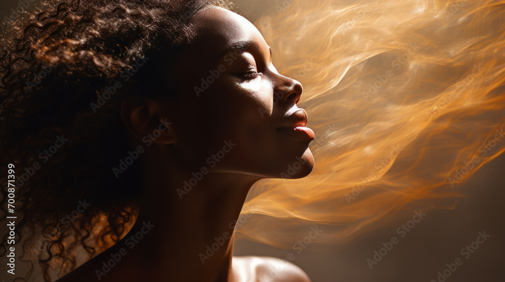Smoke emanates from a woman's hair, her face beautifully backlit ...