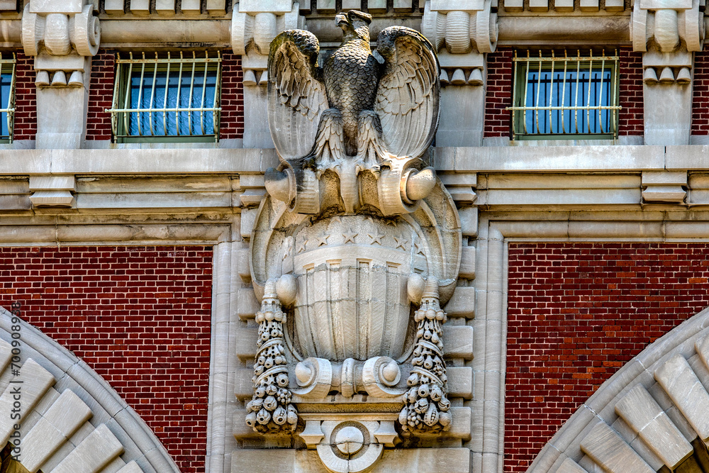 The coat of arms of the Ellis Island Immigration Museum, which was the ...