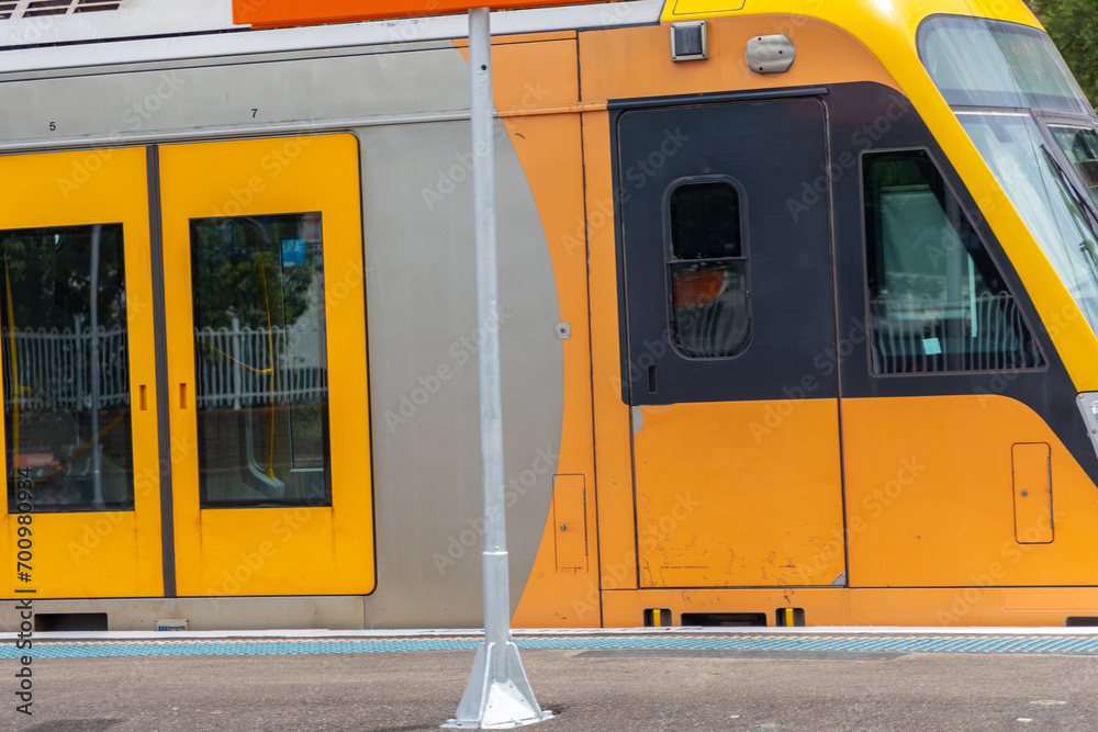 Commuter Train fast moving through a Station in Sydney NSW Australia ...