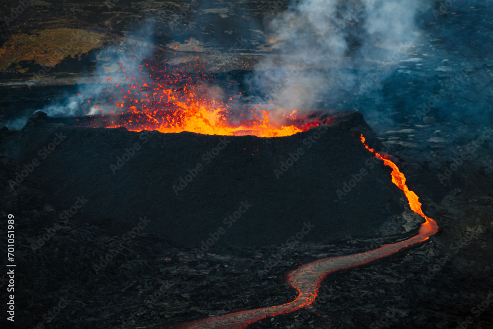 Volcano eruption in Iceland, a fountain of glowing-red lava rising ...