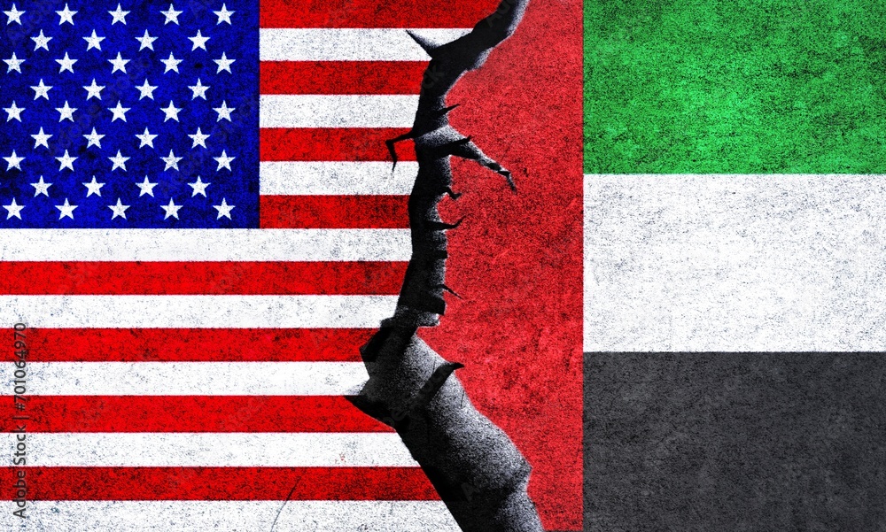 USA and UAE flags on a wall with a crack. United Arab Emirates and ...