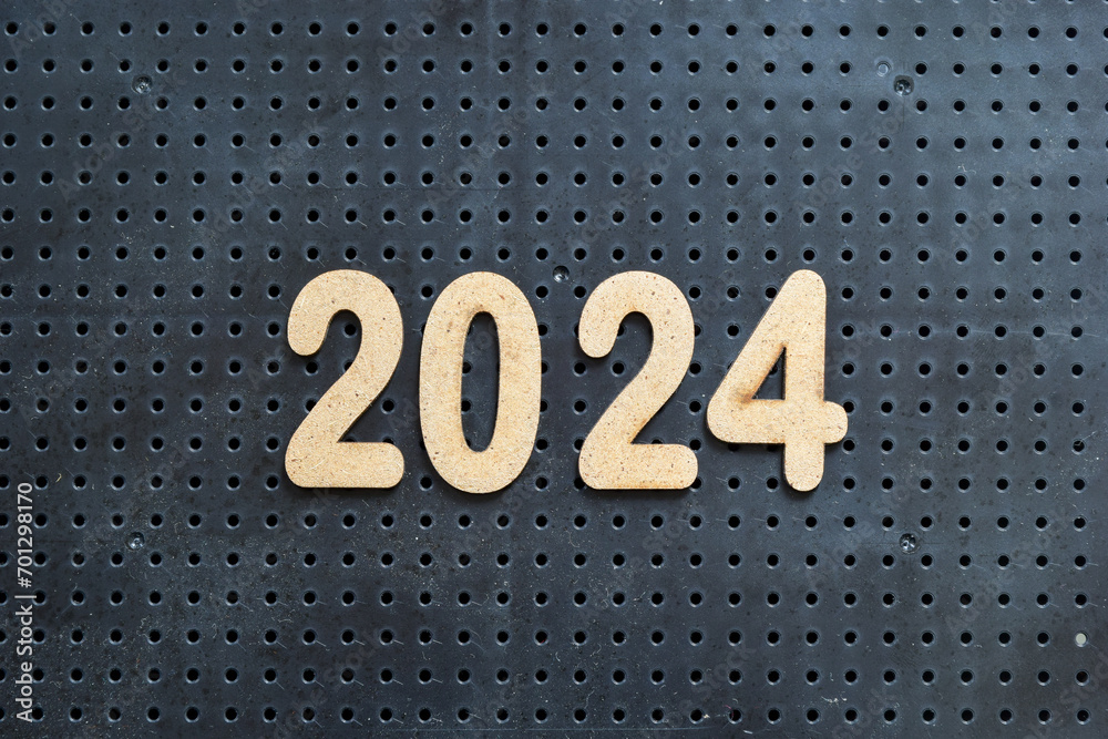 2024 number with wooden letters on the pegboard background. Stock Photo ...
