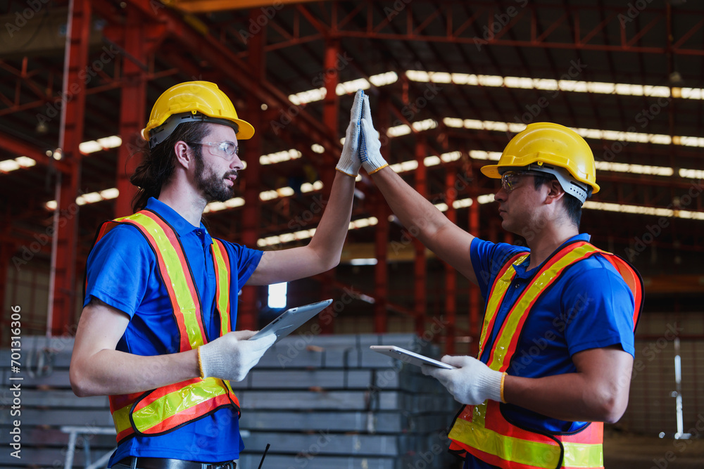 Logistics engineer and inspector holding hands with teamwork working ...