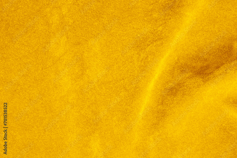 light yellow velvet fabric texture used as background. silk color gold ...