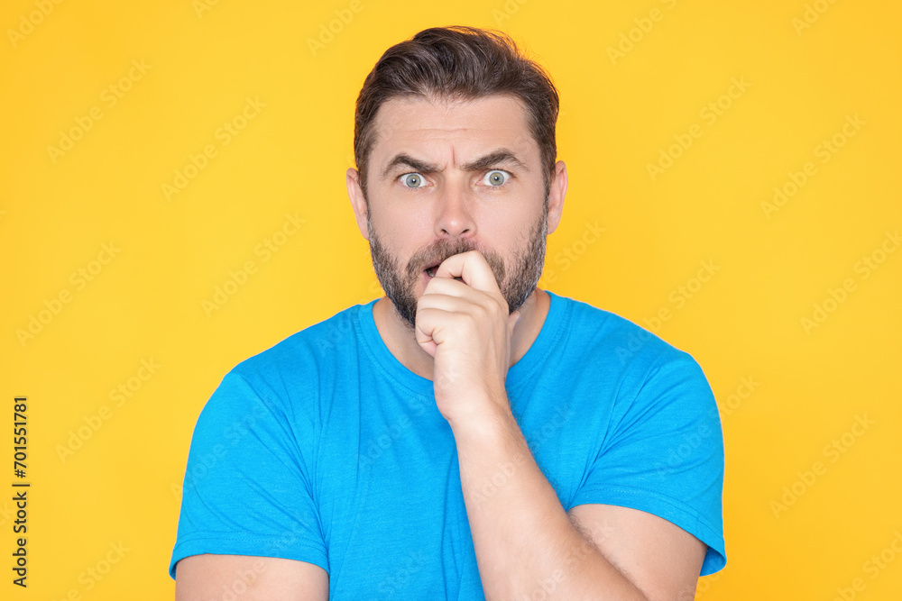 Thinking concept. Portrait of focused smart and creative man, holding ...