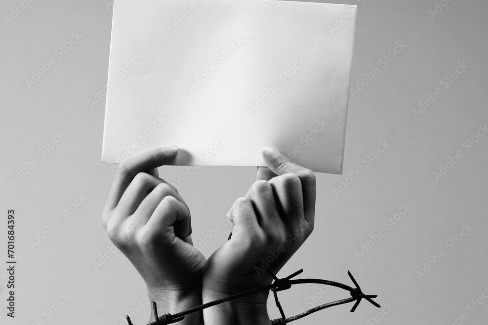 Conceptual image: Stolen freedom, stolen life. Black and white image of ...