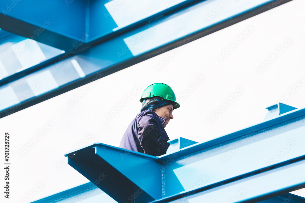Manual worker working at shipyard construction site Stock Photo | Adobe ...