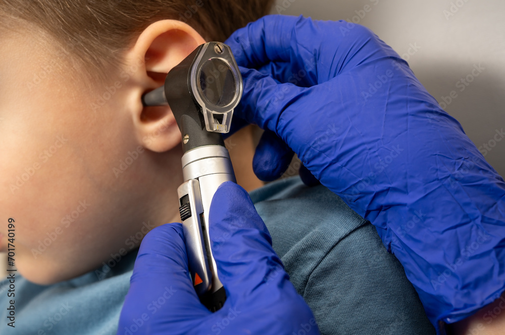 a little boy in the otolaryngologist's office, an examination of the ...