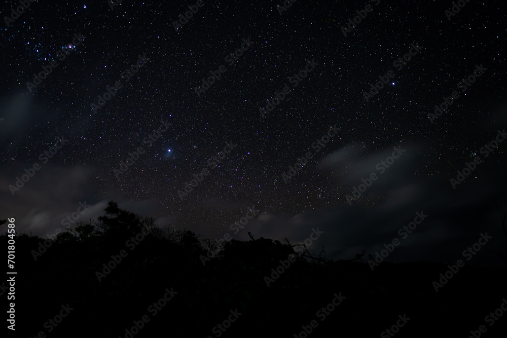 View of stars and clouds at Savinia beach located on the south coast of ...