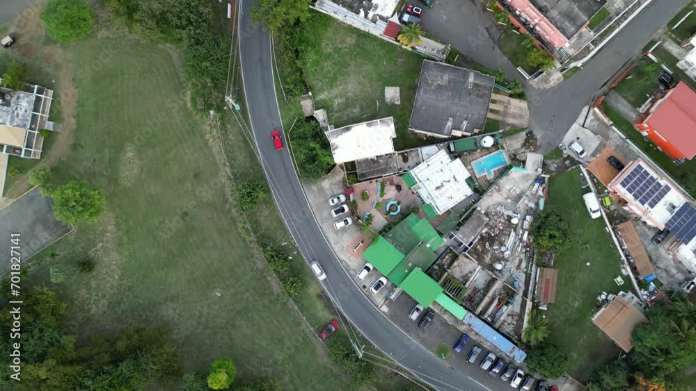 cars driving on a curved, winding road in fajardo, puerto rico (paved ...