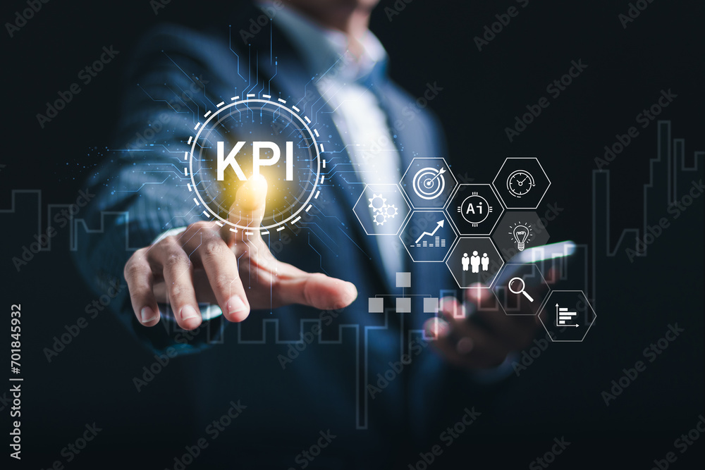 KPI, business performance indicators, Businessman touch with data ...