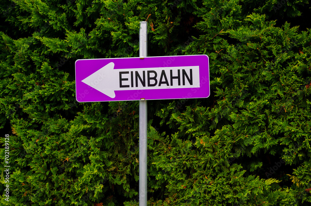 Austrian road sign "Einbahn", which translates as one-way traffic ...