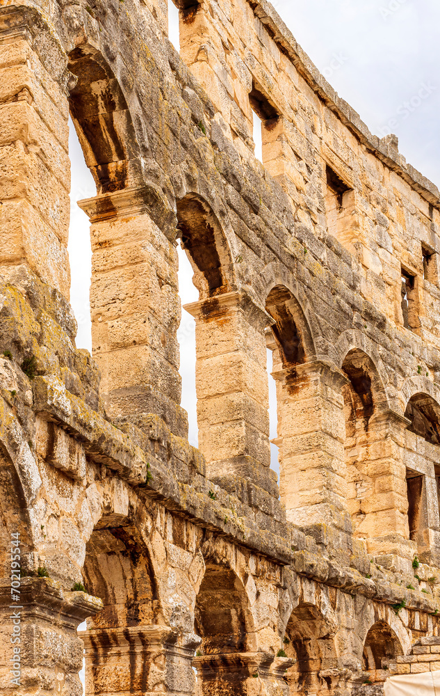 arc wall of ancient building in arena colosseum style, typical roman ...