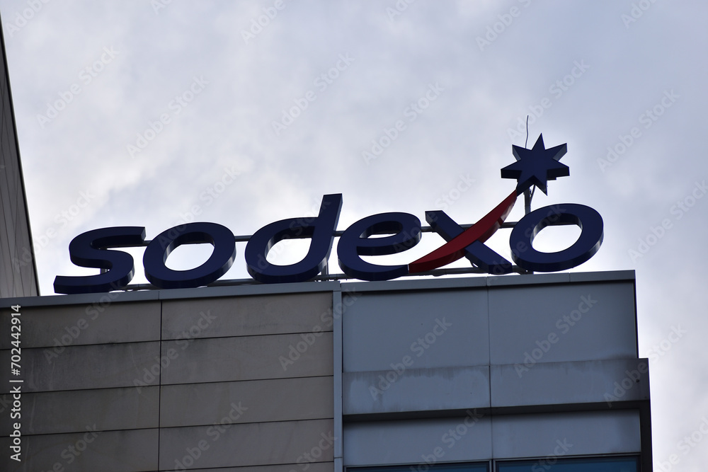 Sodexo company logo, signage, emblem on the facade. French food ...