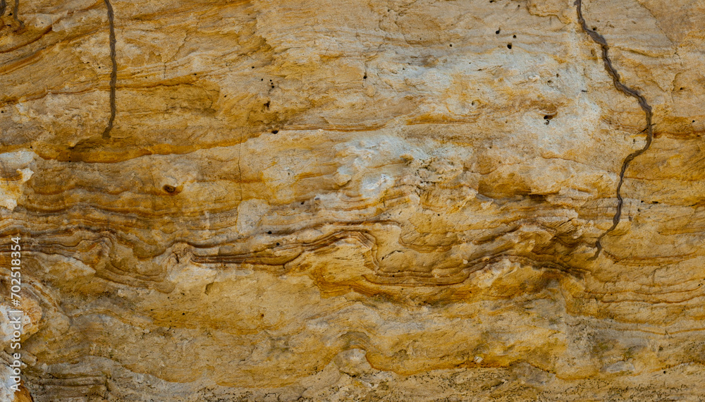 Sand quarry. Sedimentary rocks with a high content of iron oxide. Red ...