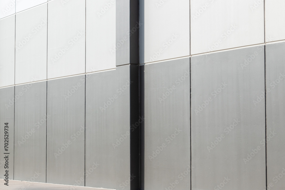 The exterior wall of a contemporary commercial style building with ...