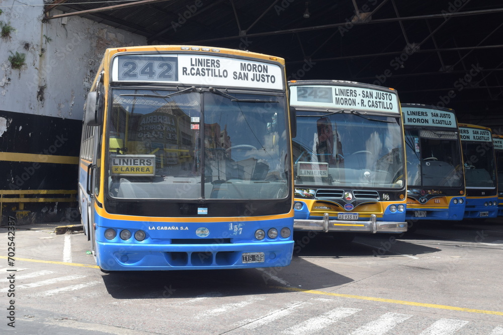 Argentine buses parked at their terminal. Public transportation concept ...