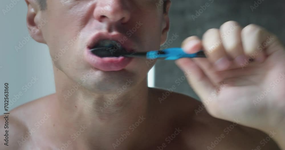 Man brushing teeth, close up. Morning everyday brushing routine. Proper ...