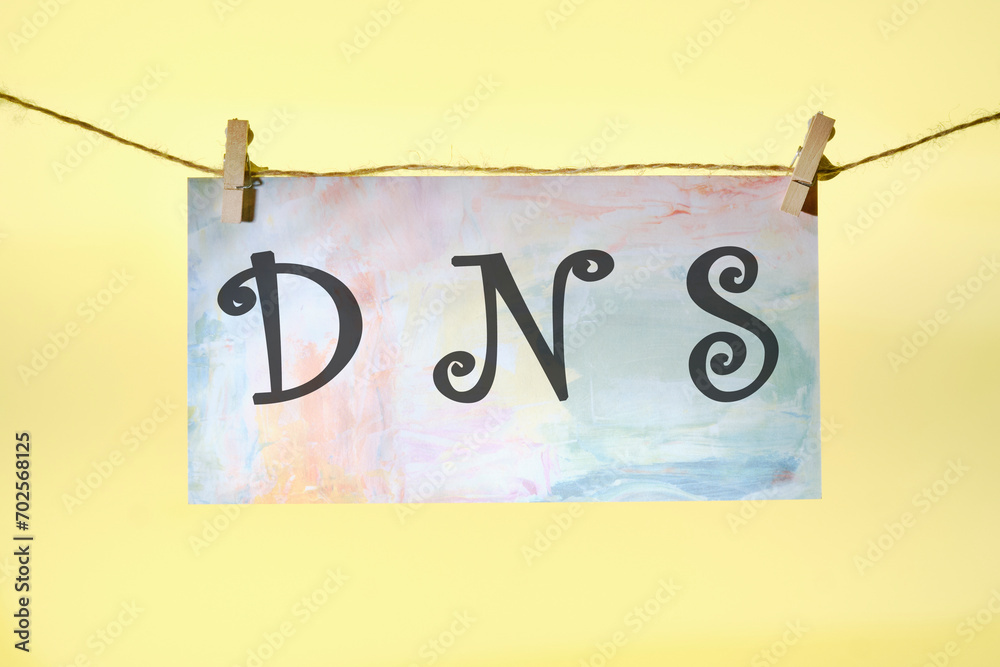 DNS -Domain Name Server lettering on colored paper hanging in front of ...