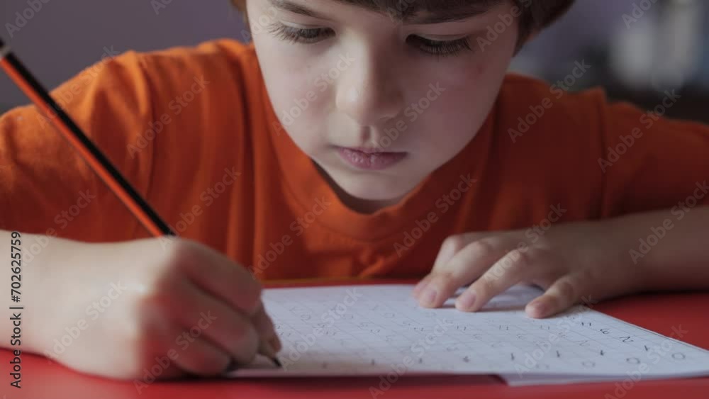 School Boy Practicing Writing Numbers at Home. Child Working on His ...