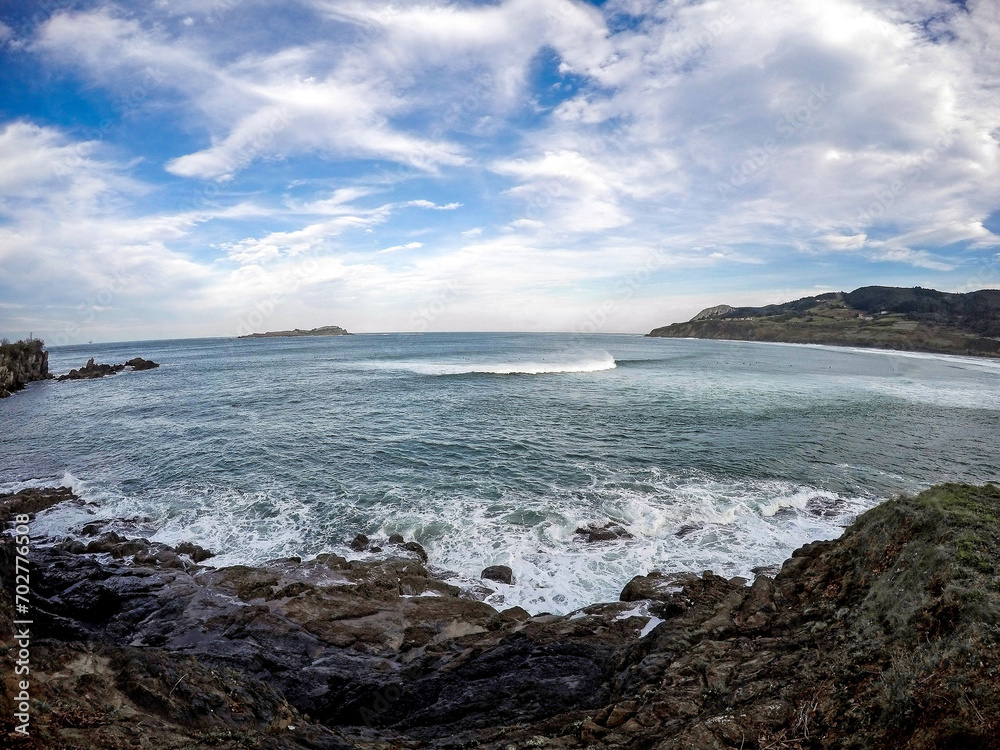 Wide angle Gopro panorama of the landscape of Mundaka in Spain. View of ...