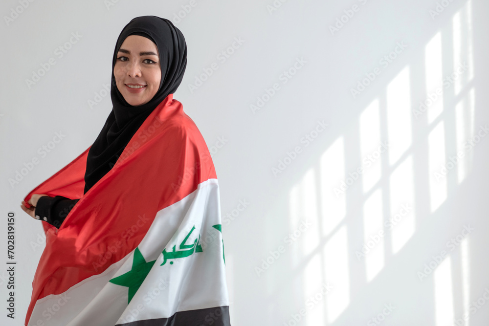 Happy Muslim woman wearing black Muslim hijab covering her body with ...