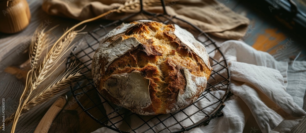 Home baked farmhouse mixed bread Close up on loaf of bread baked in ...