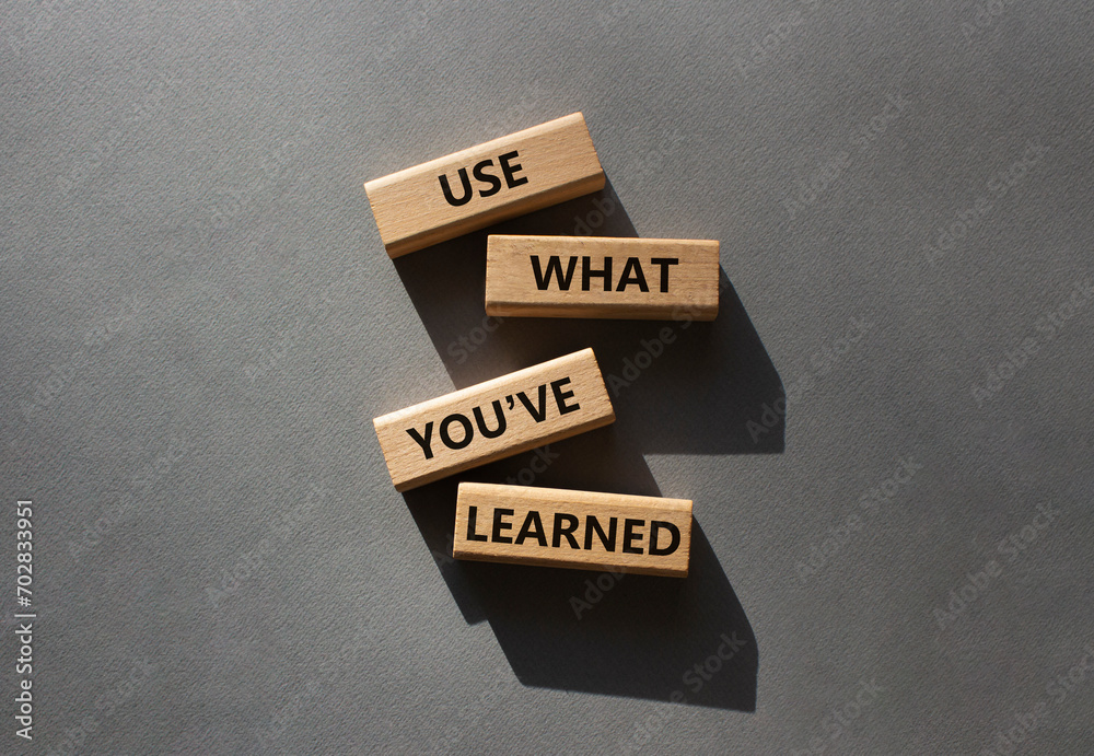 Use what You have learned symbol. Wooden blocks with words Use what You have learned. Beautiful ...