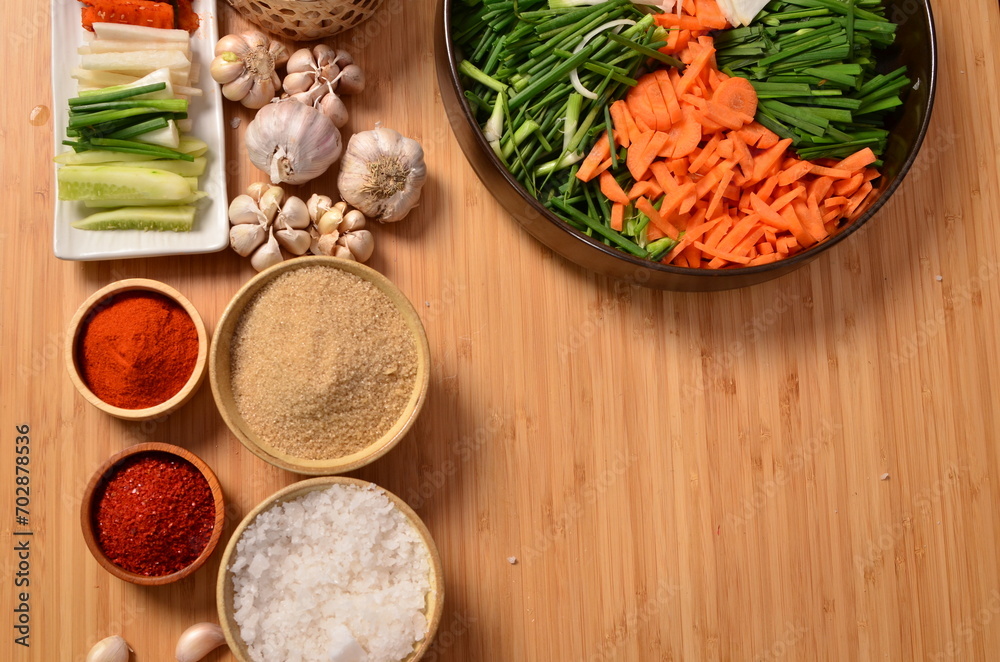 vegetables, fruits, and various cooking ingredients are lined up ...
