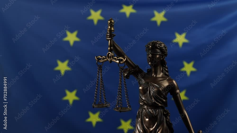 The Lady Justice statue rotates against the background of the European ...