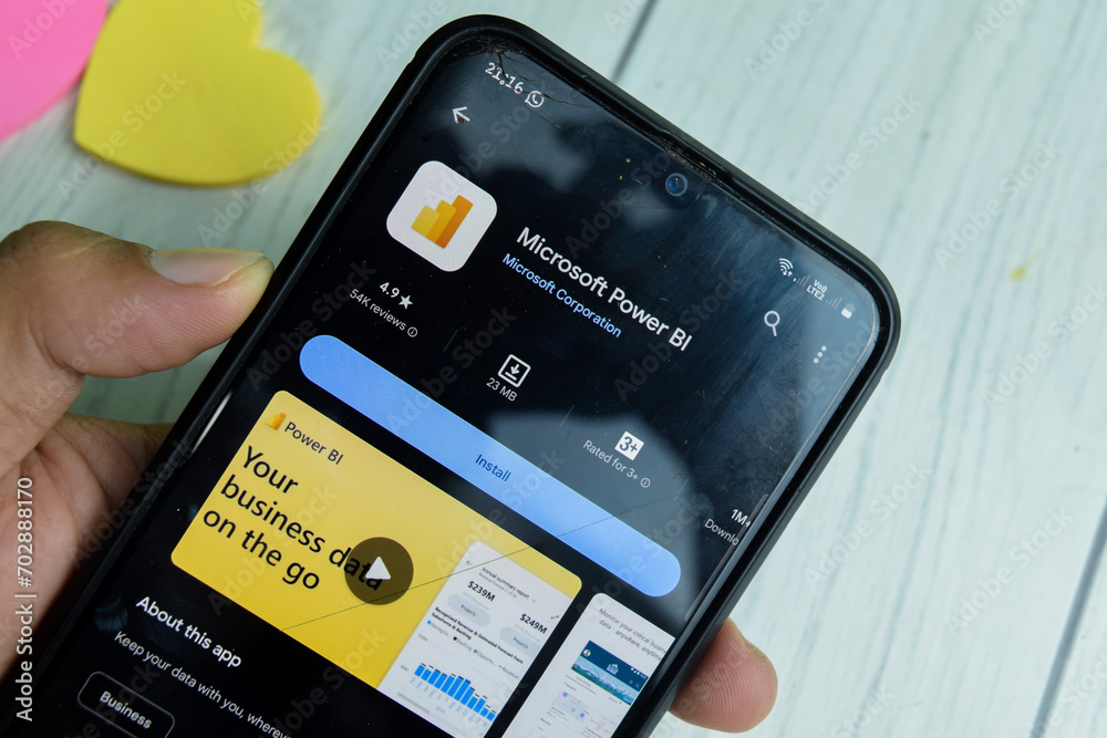 Microsoft Power BI application on Smartphone screen. Power BI is a ...